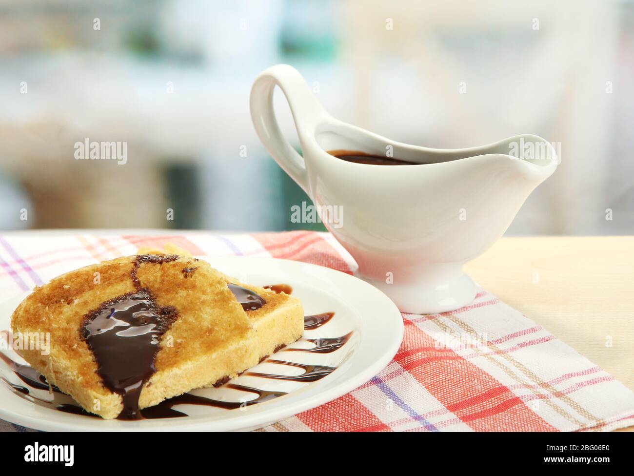 White bread toast with chocolate on plate in cafe Stock Photo - Alamy