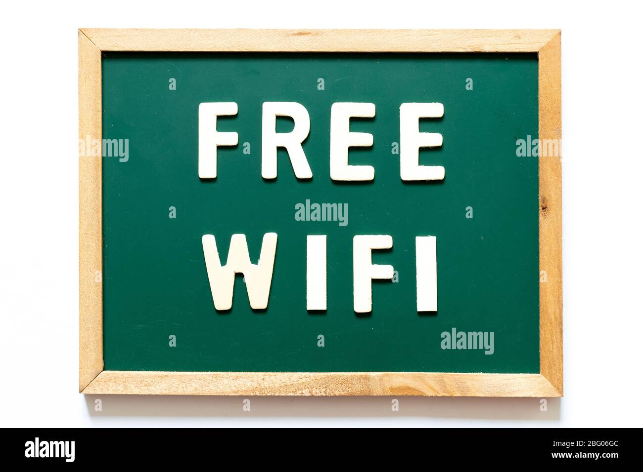 Green blackboard and wood frame with word free wifi on white background ...