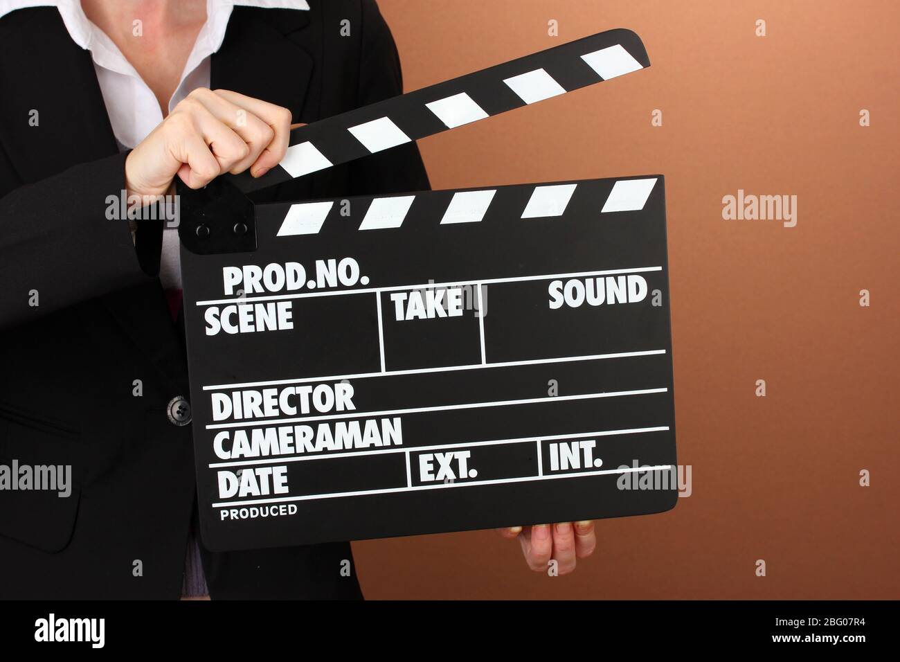 Movie production clapper board on color background Stock Photo - Alamy