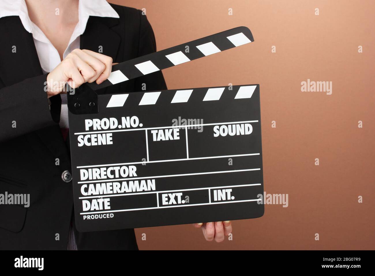 Movie production clapper board on color background Stock Photo - Alamy