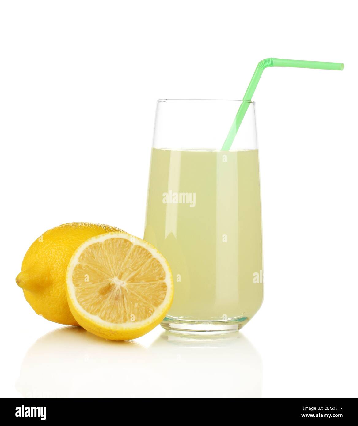 Delicious lemon juice in glass and lemons next to it isolated on white ...