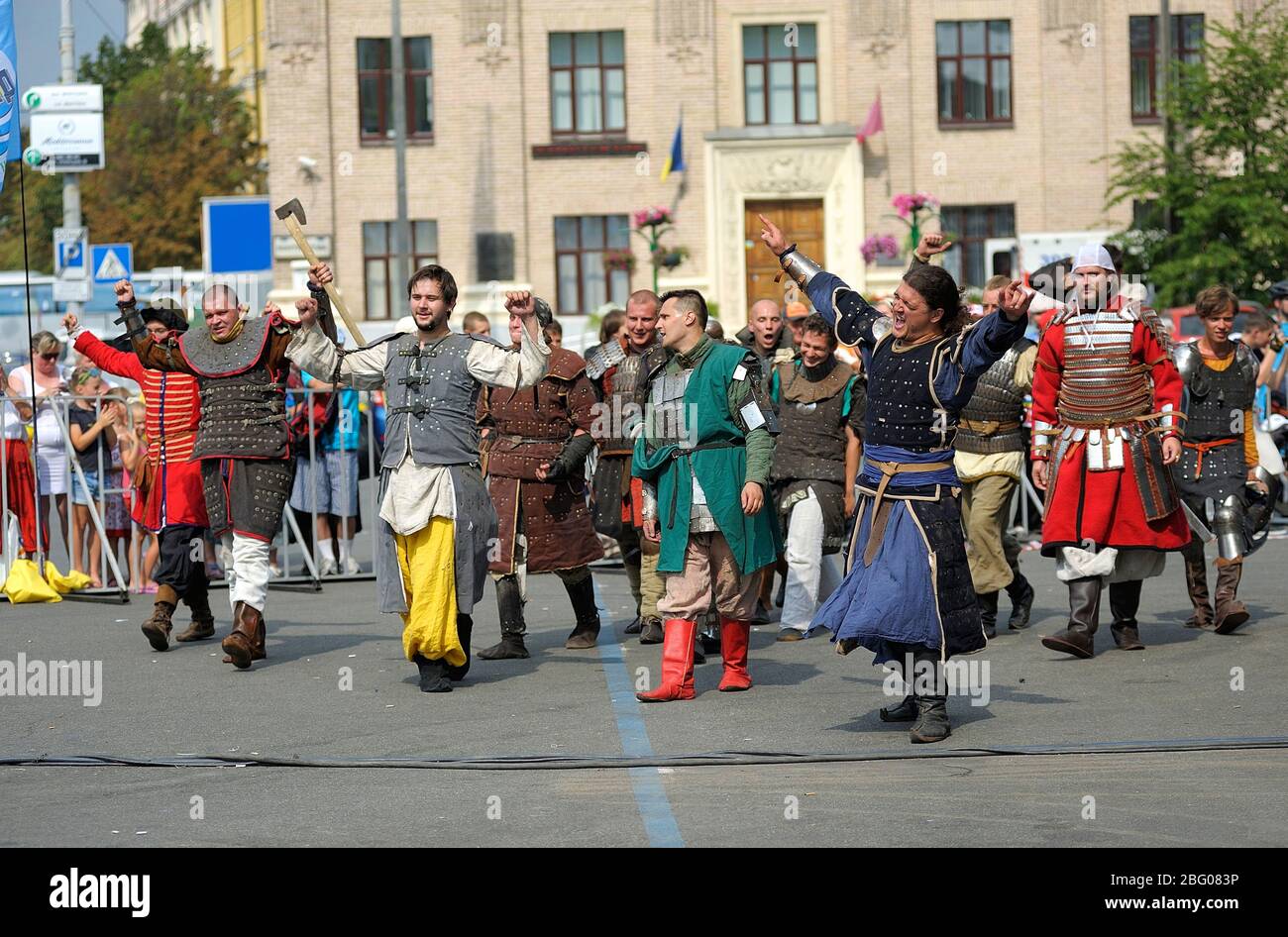 Reenactors dressed in armor of an Old Russian footmen dancing after ...