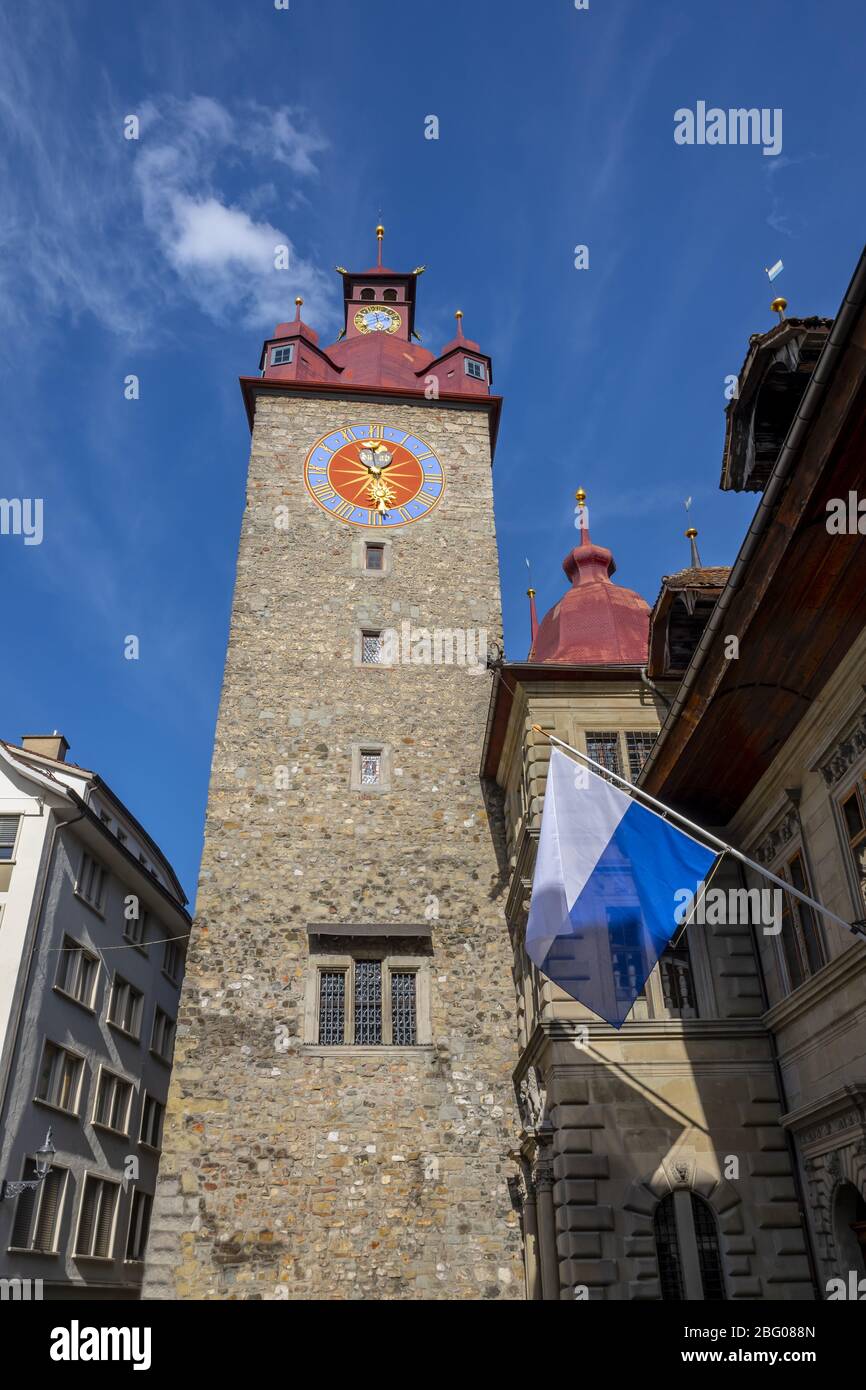 Town Hall of Lucerne with Flag and Blue Sky in Switzerland Stock Photo ...