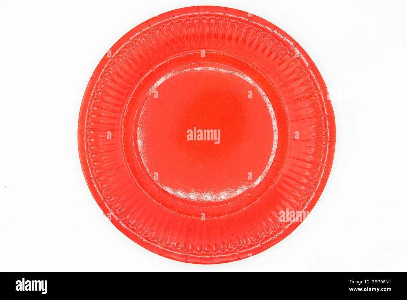 Red cardboard plate on white background Stock Photo - Alamy