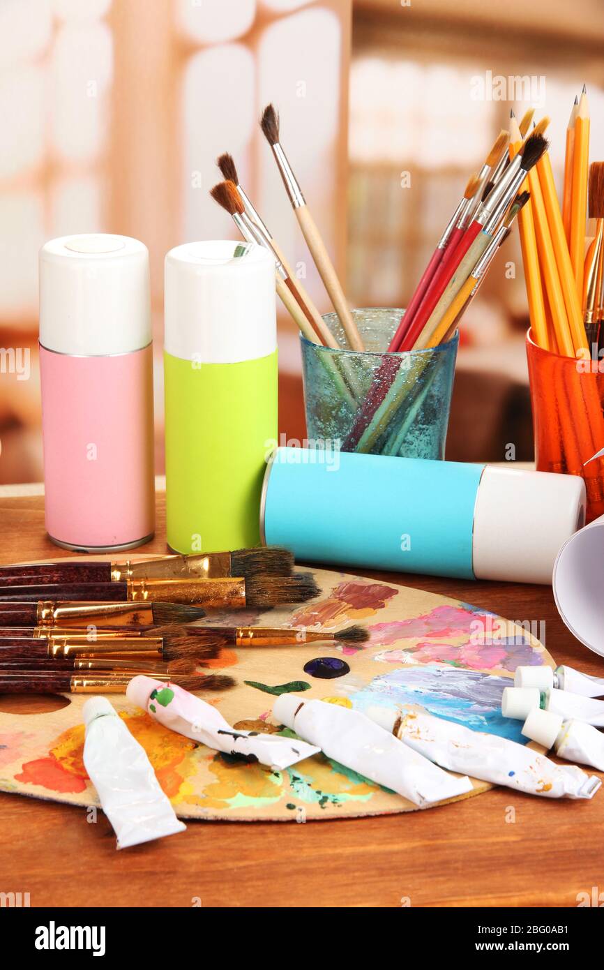 Artistic equipment: paint, brushes and art palette Stock Photo - Alamy