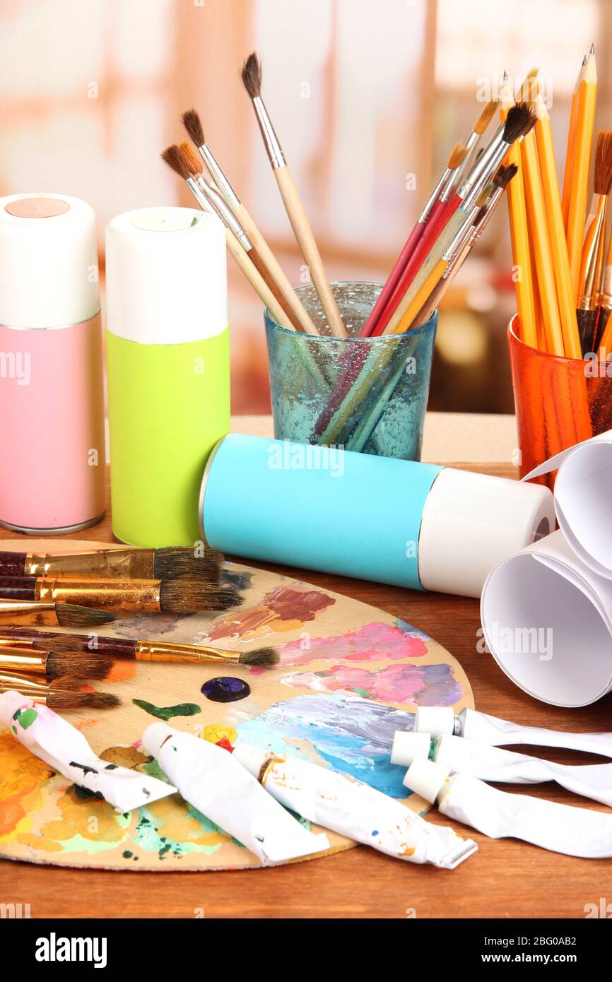 Artistic equipment: paint, brushes and art palette Stock Photo - Alamy