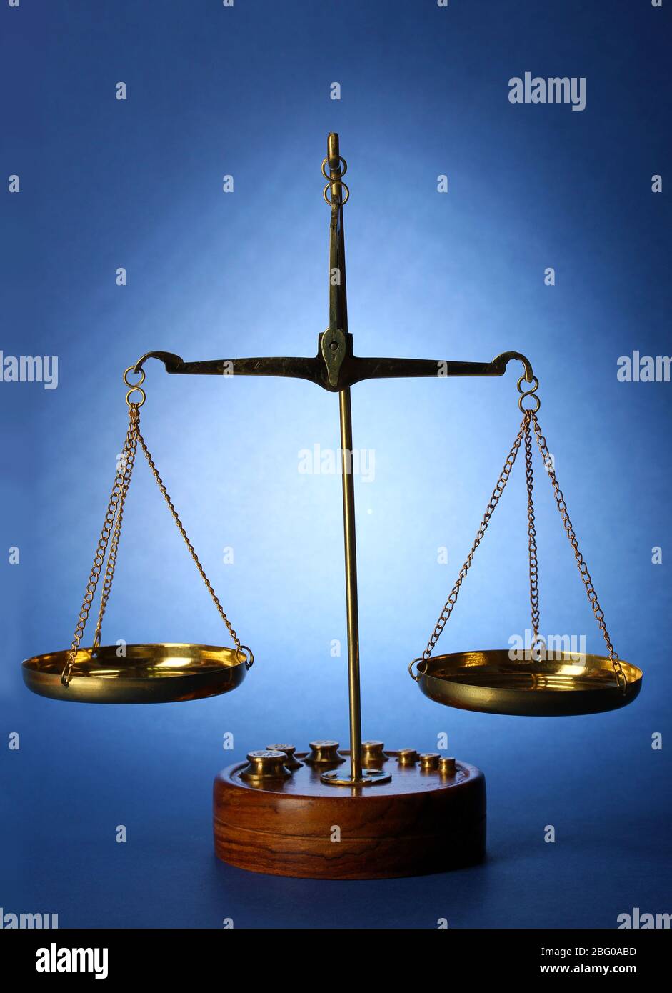 Classic scales on blue background Stock Photo - Alamy
