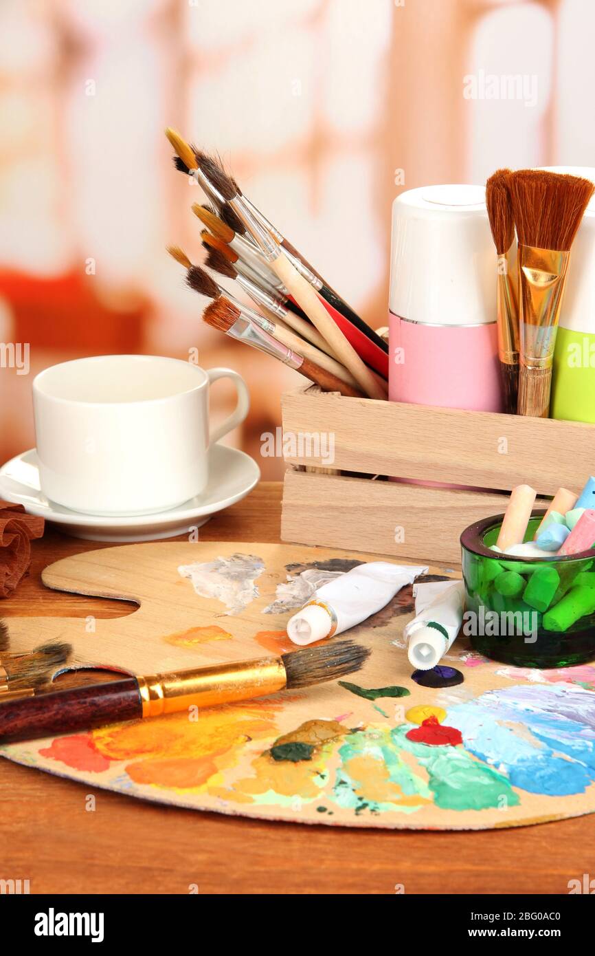 Artistic equipment: paint, brushes and art palette Stock Photo - Alamy