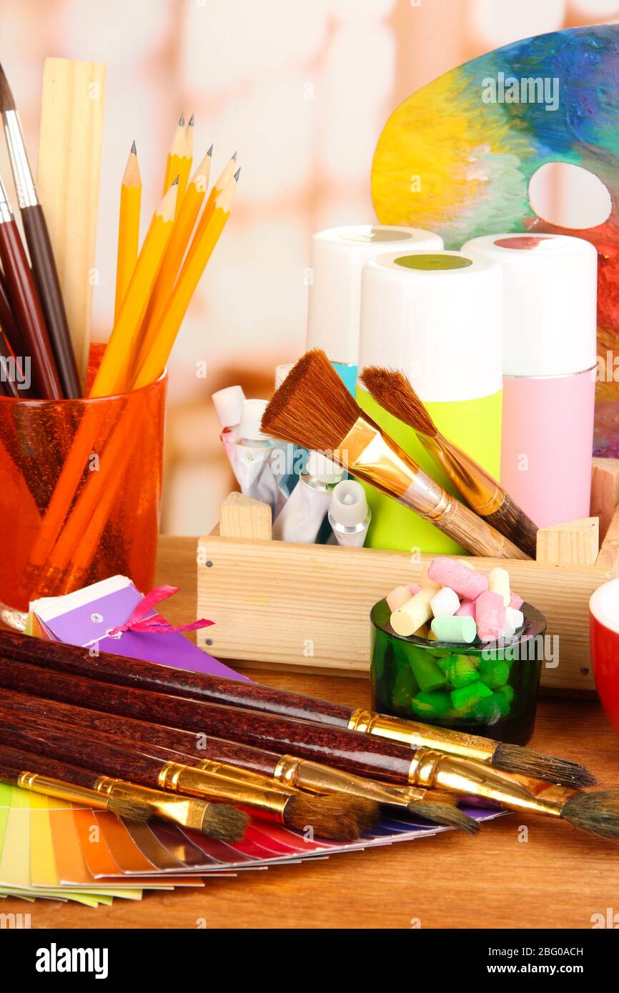 Artistic equipment: paint, brushes and art palette Stock Photo - Alamy