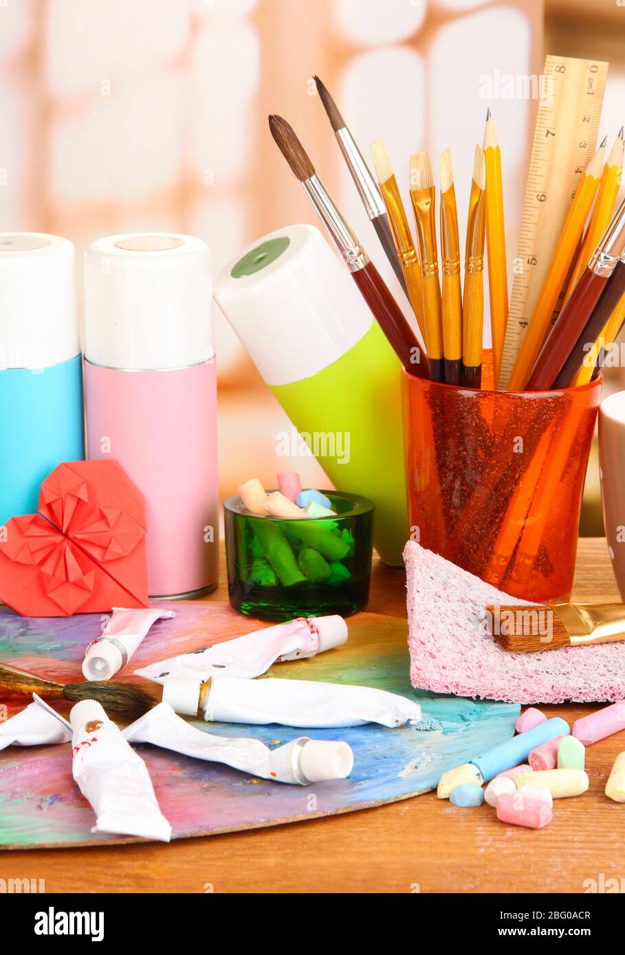 Artistic equipment: paint, brushes and art palette Stock Photo - Alamy