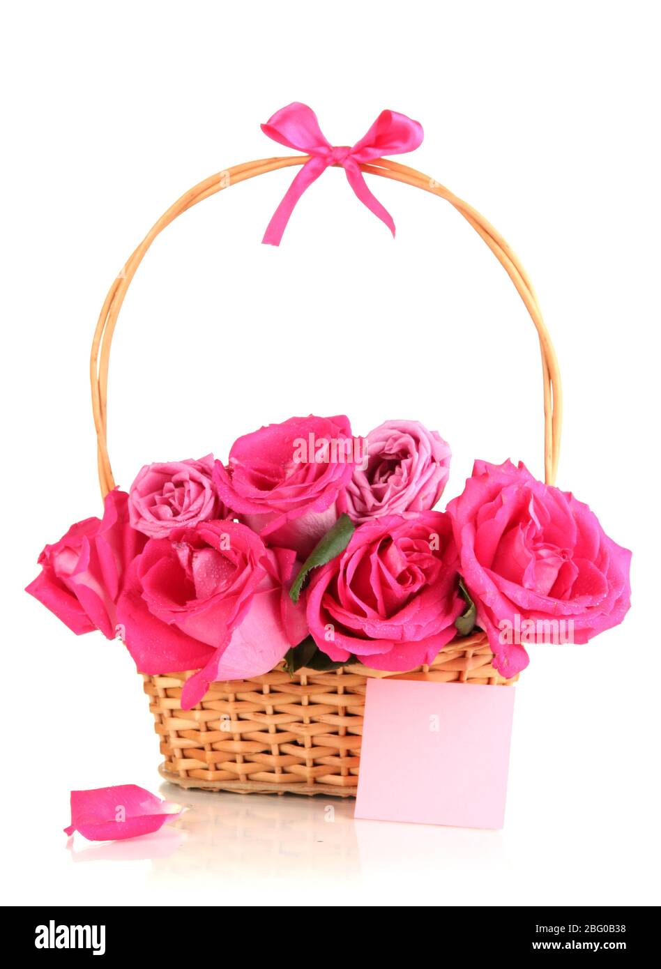 Beautiful pink roses in basket isolated on white Stock Photo - Alamy