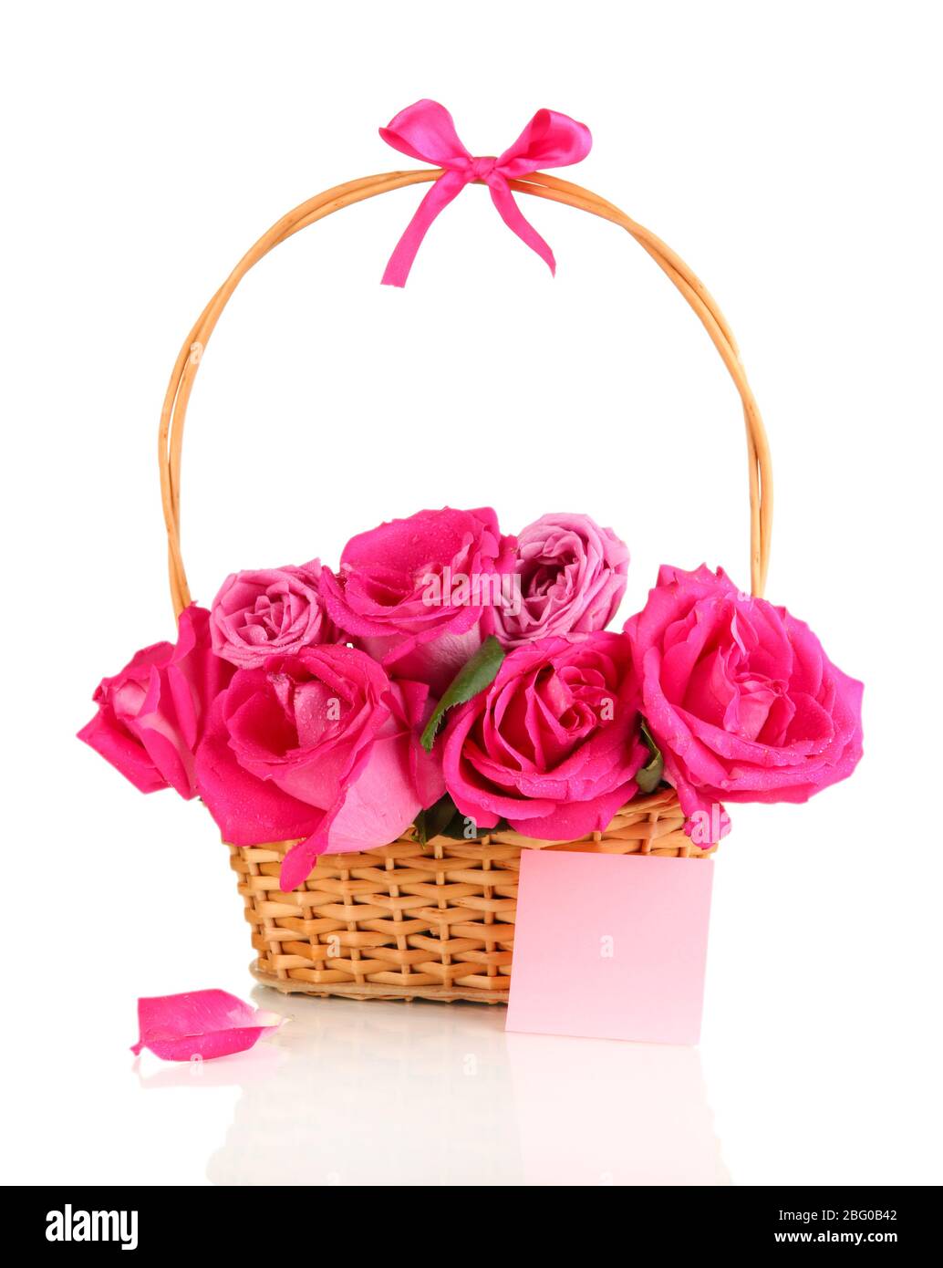 Beautiful pink roses in basket isolated on white Stock Photo - Alamy