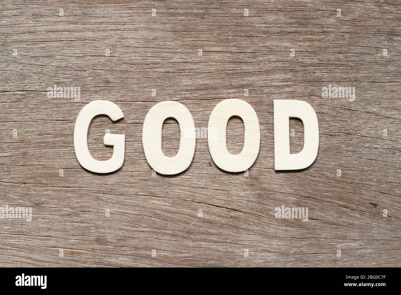 Alphabet letter in word good on wood background Stock Photo - Alamy