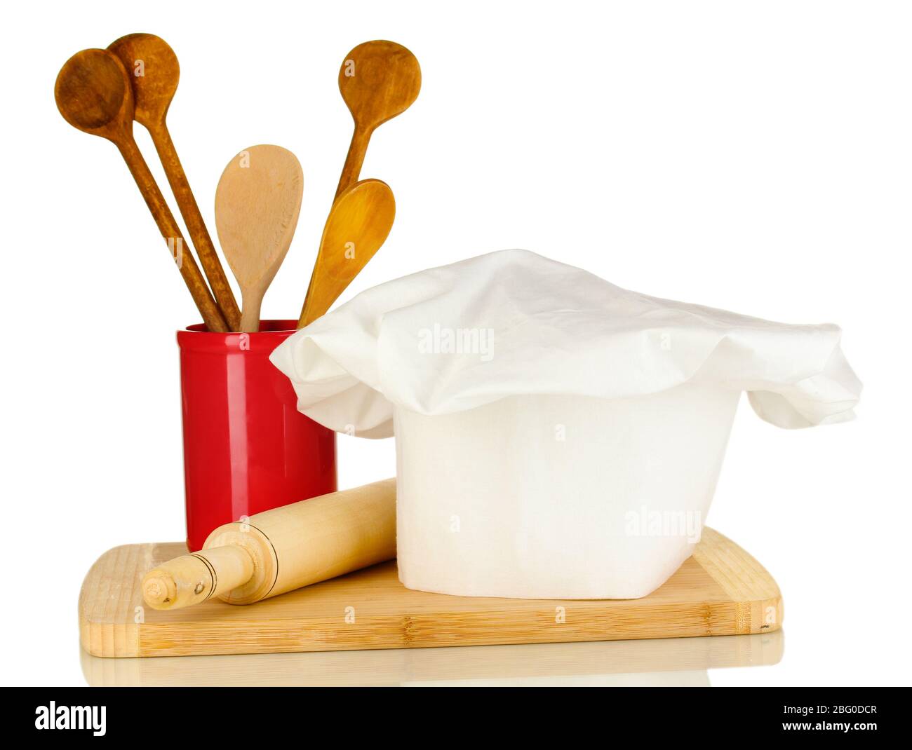 Chef's hat with spoons and battledore isolated on white Stock Photo - Alamy