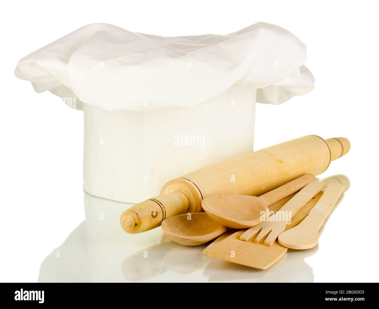 Chef's hat with spoons and battledore isolated on white Stock Photo - Alamy