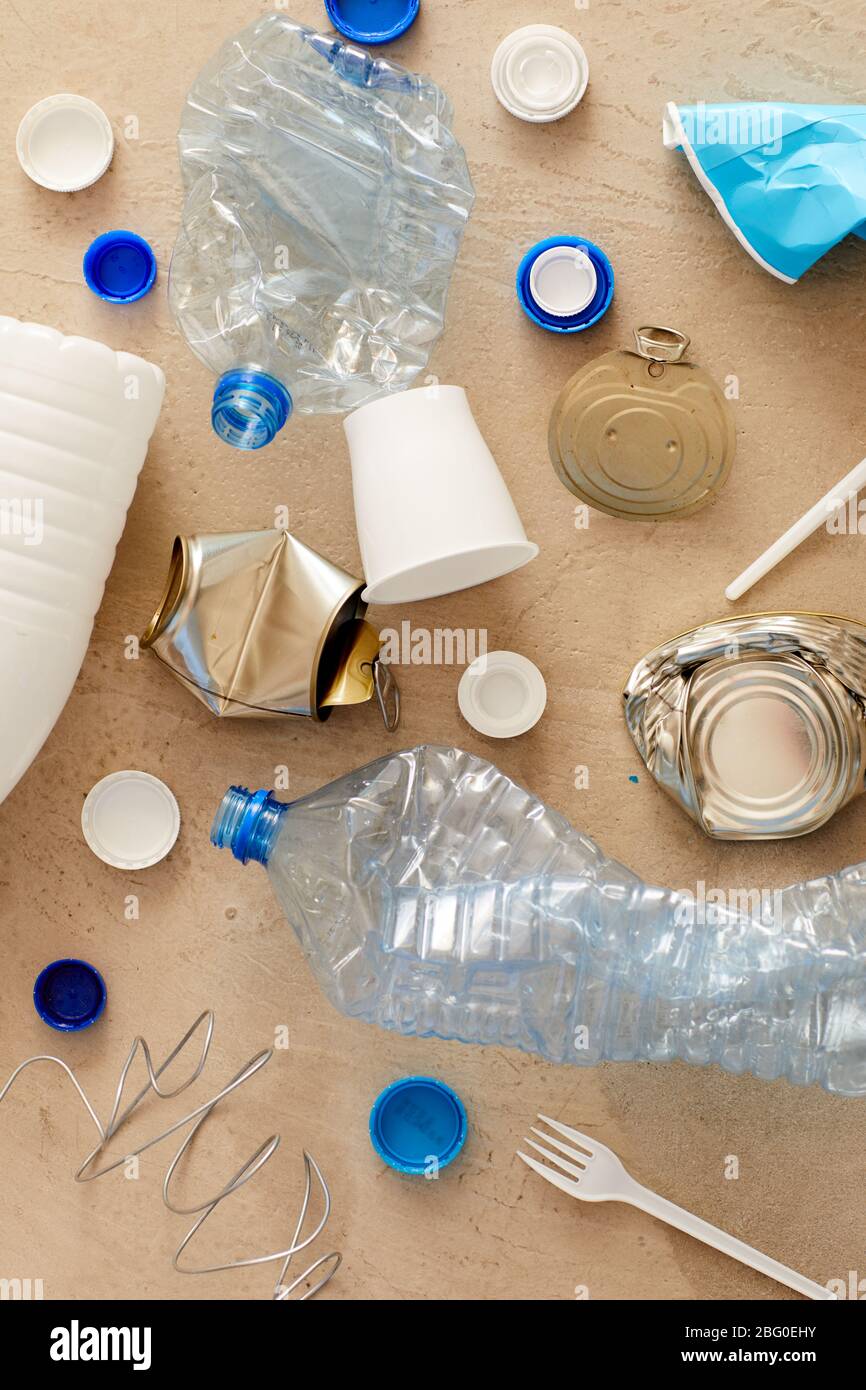 Above view of various trash items laid in minimal composition on ...