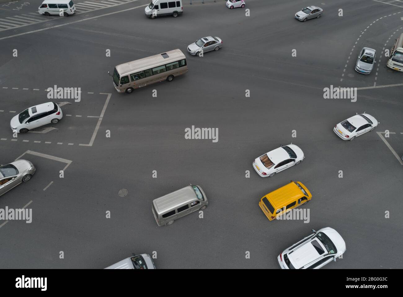 Aerial view on busy traffic intersection Stock Photo - Alamy