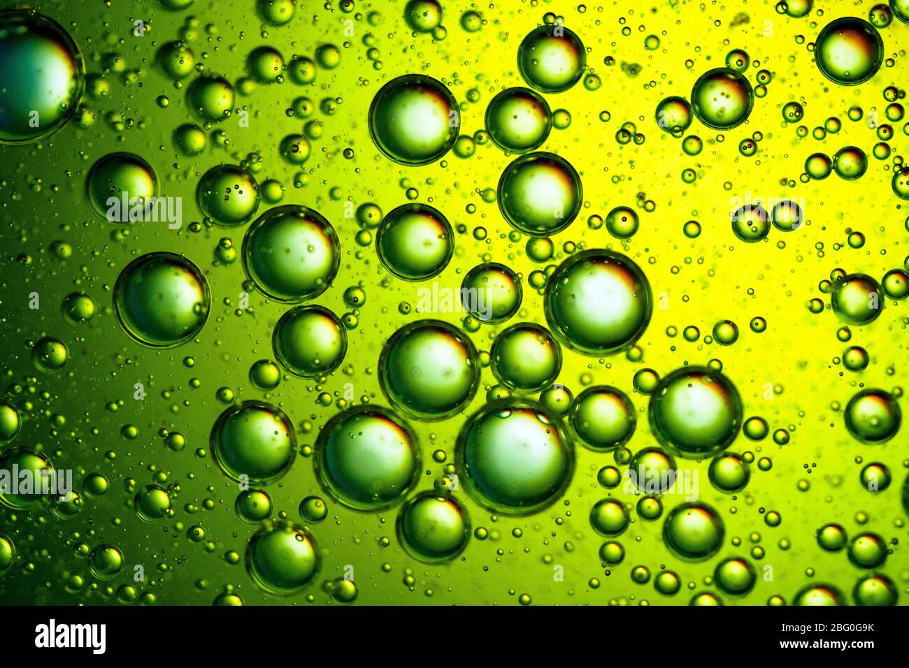 Oil bubbles in water Stock Photo - Alamy