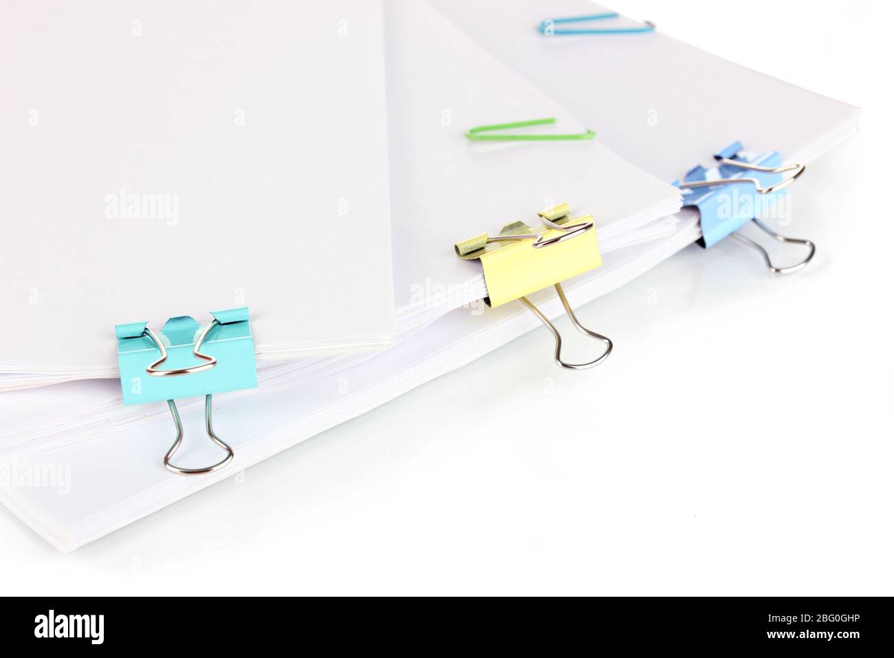 Documents with binder clips close up Stock Photo - Alamy