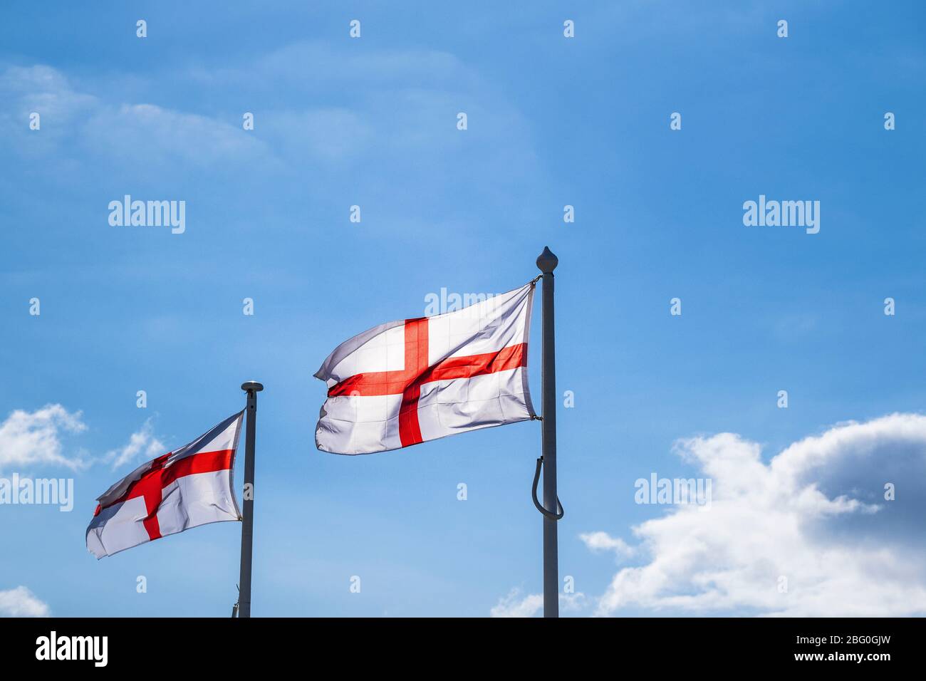Flags of the Cross of St George fluttering in the wind seen against a ...