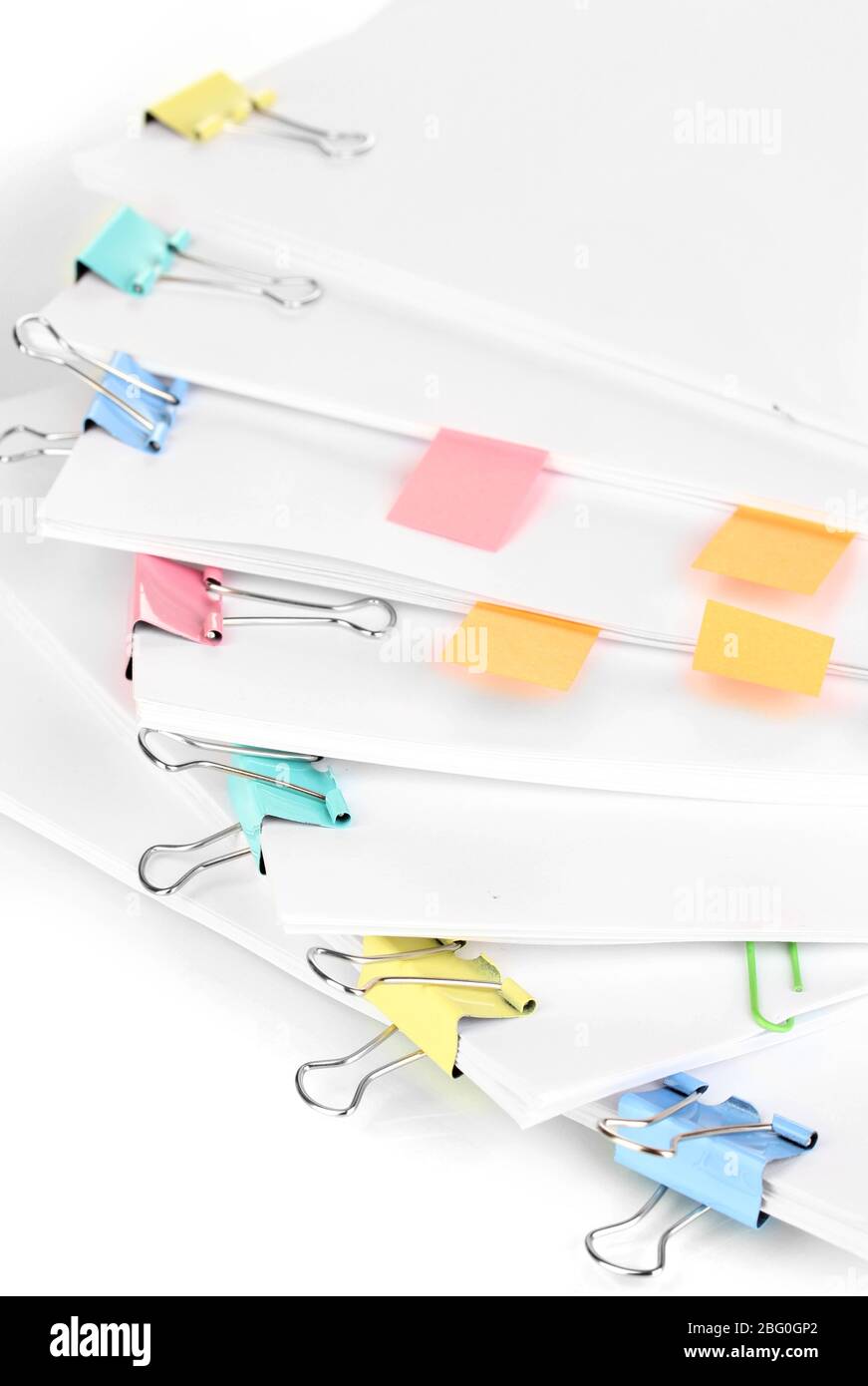 Documents with binder clips close up Stock Photo - Alamy
