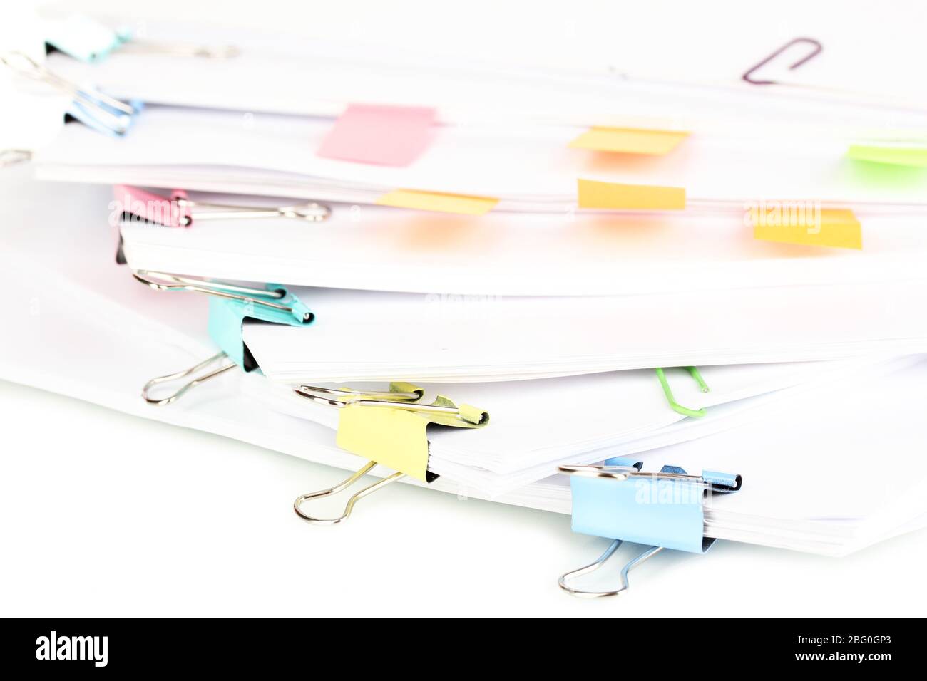 Documents with binder clips close up Stock Photo - Alamy