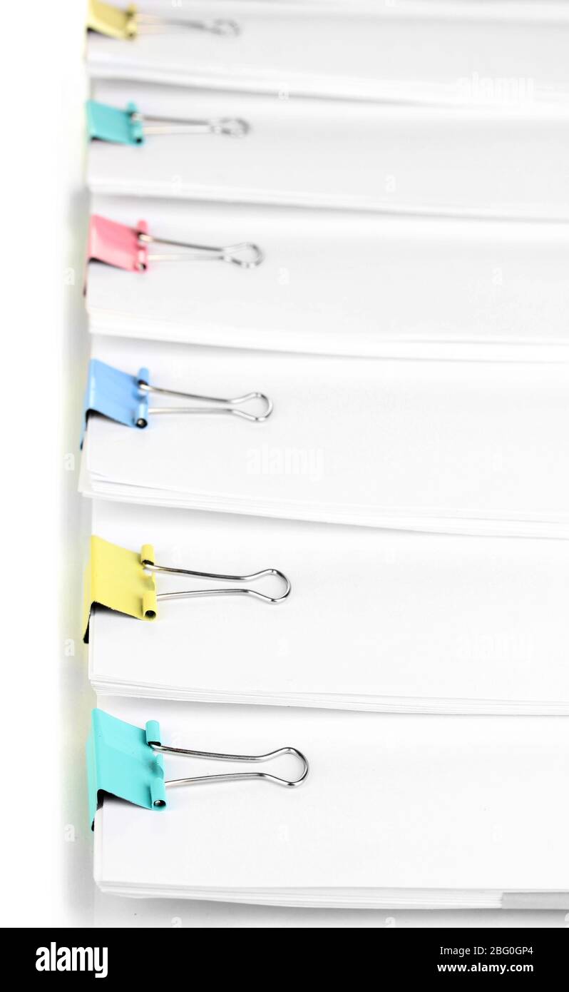 Documents with binder clips close up Stock Photo - Alamy