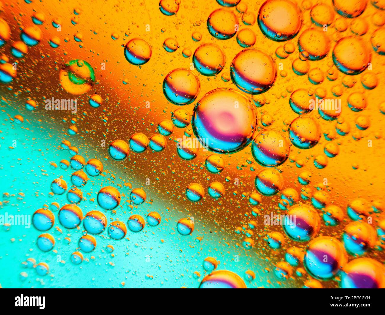Oil bubbles in water Stock Photo - Alamy