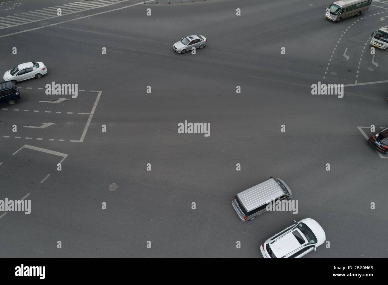 Aerial view on busy traffic intersection Stock Photo - Alamy