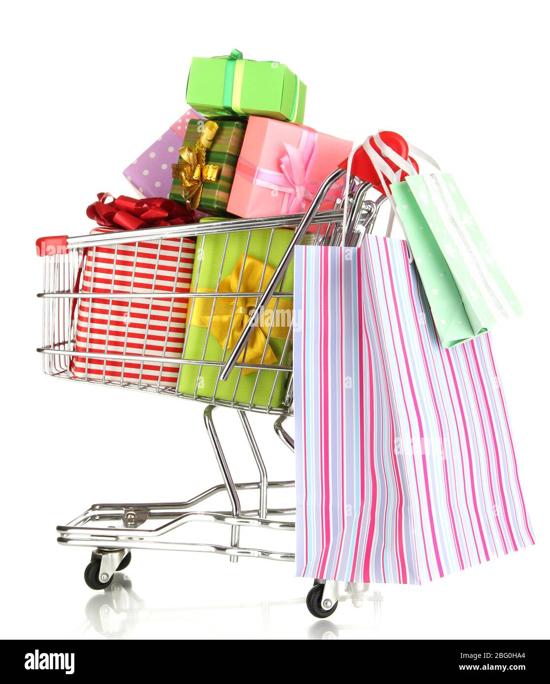 Christmas gifts and shopping in trolley isolated on white Stock Photo ...