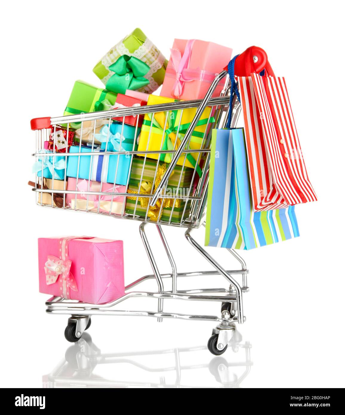Christmas gifts and shopping in trolley isolated on white Stock Photo ...