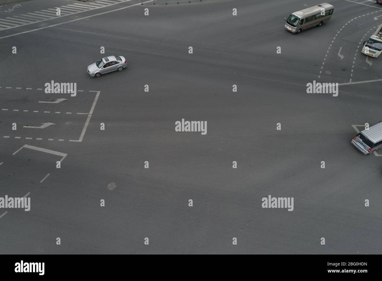Aerial view on busy traffic intersection Stock Photo - Alamy