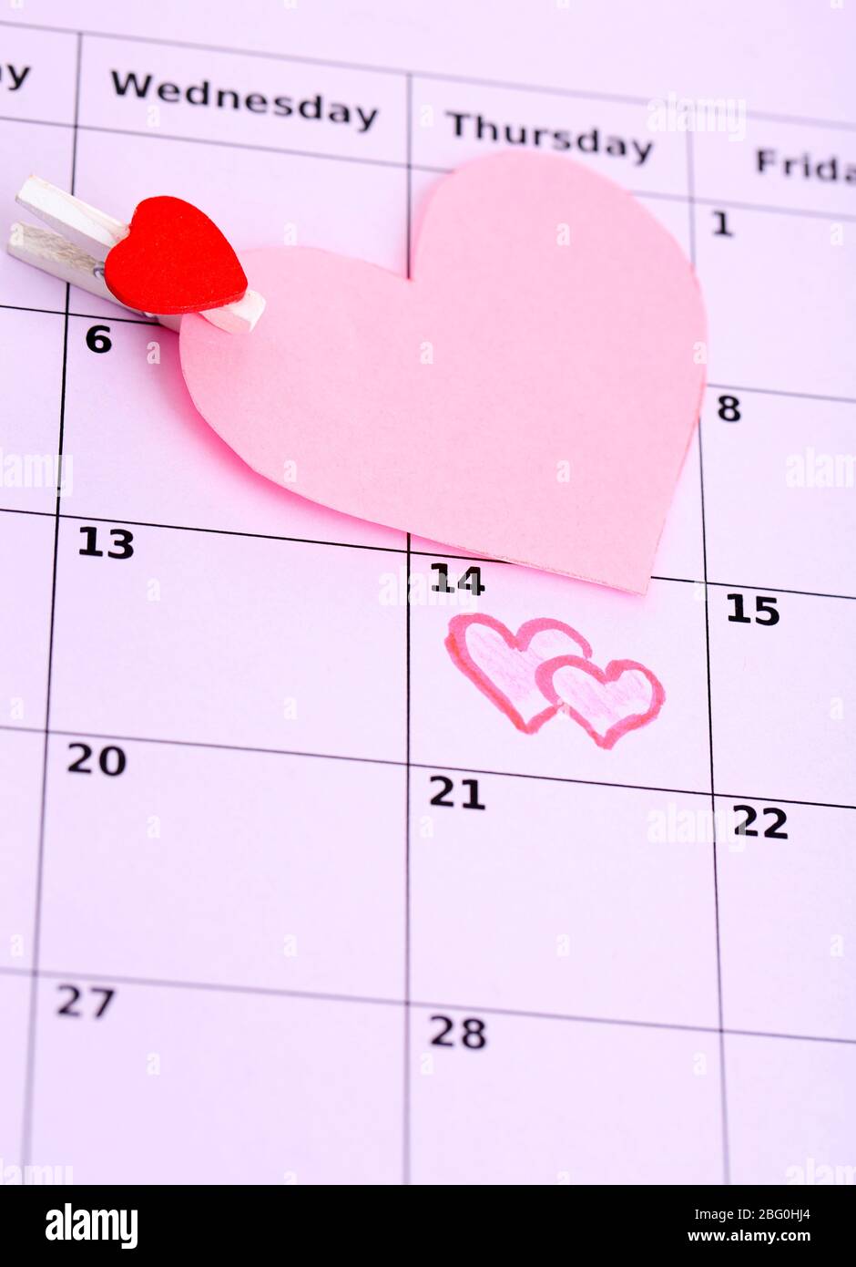 Notes on the calendar (valentines day), close-up Stock Photo - Alamy