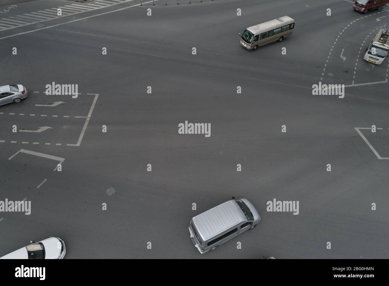 Aerial view on busy traffic intersection Stock Photo - Alamy