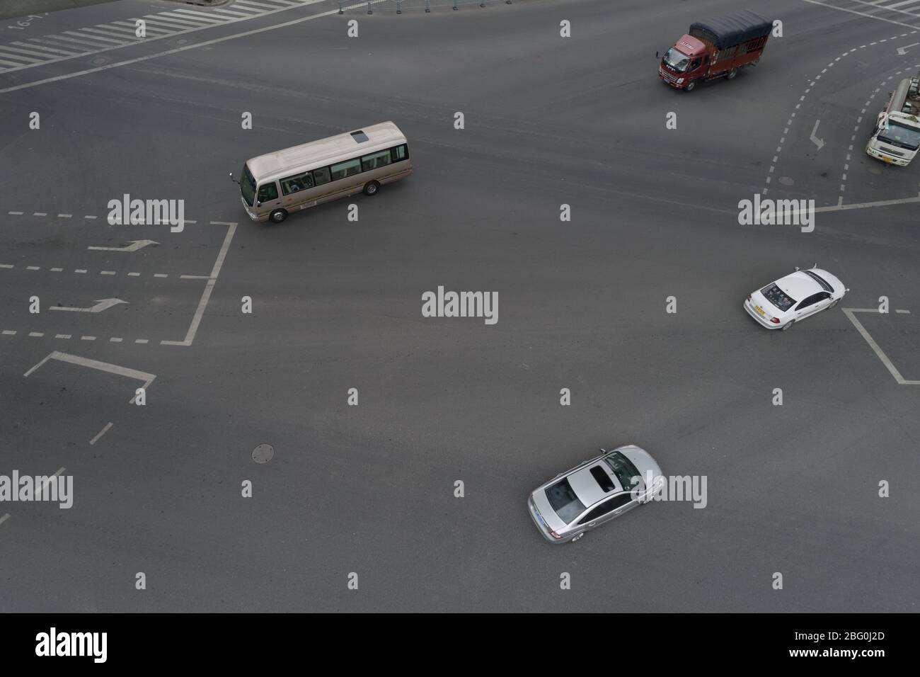Aerial view on busy traffic intersection Stock Photo - Alamy