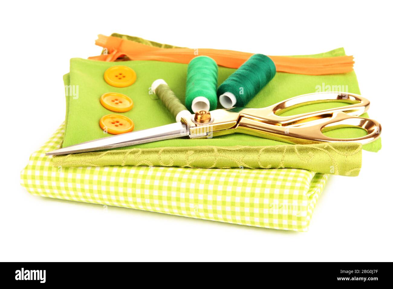Sewing accessories and fabric isolated on white Stock Photo - Alamy