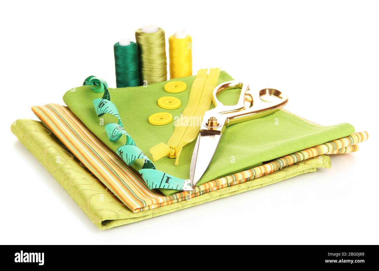Sewing accessories and fabric isolated on white Stock Photo - Alamy