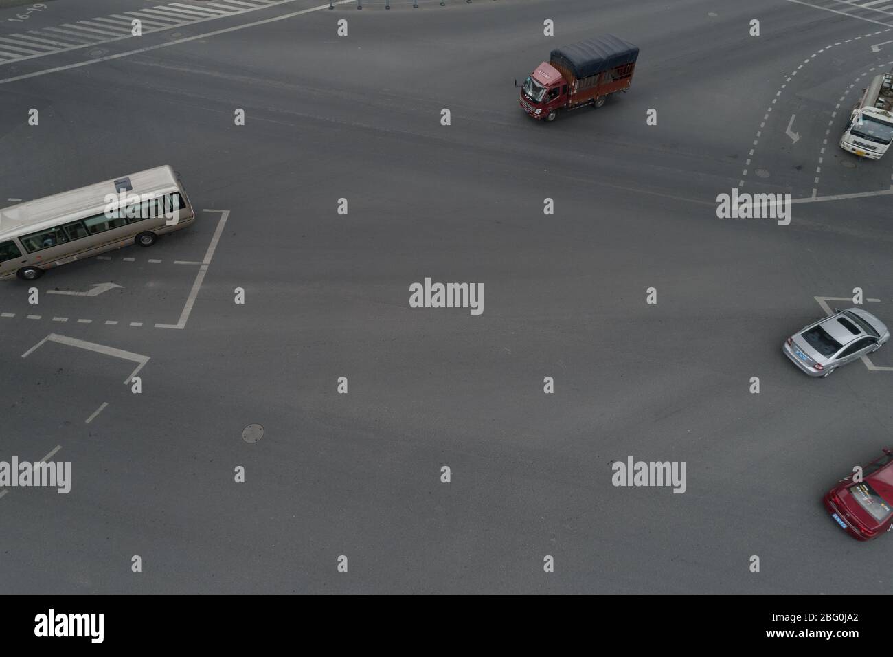 Aerial view on busy traffic intersection Stock Photo - Alamy