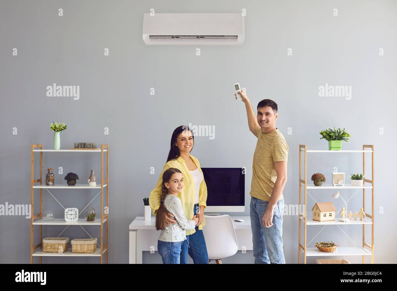 The family uses air conditioning at home Stock Photo - Alamy