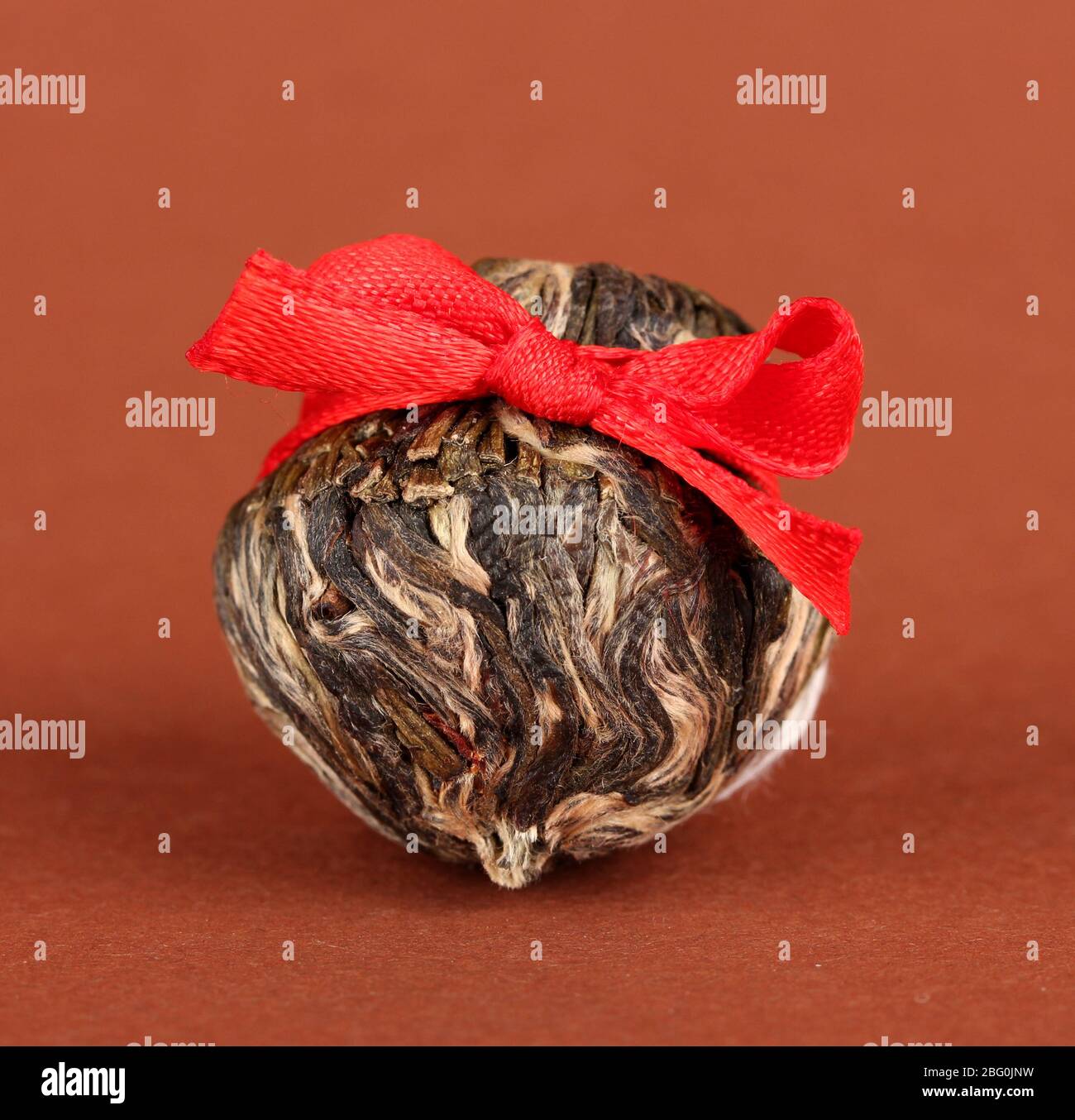 Chinese blooming tea on color background Stock Photo - Alamy