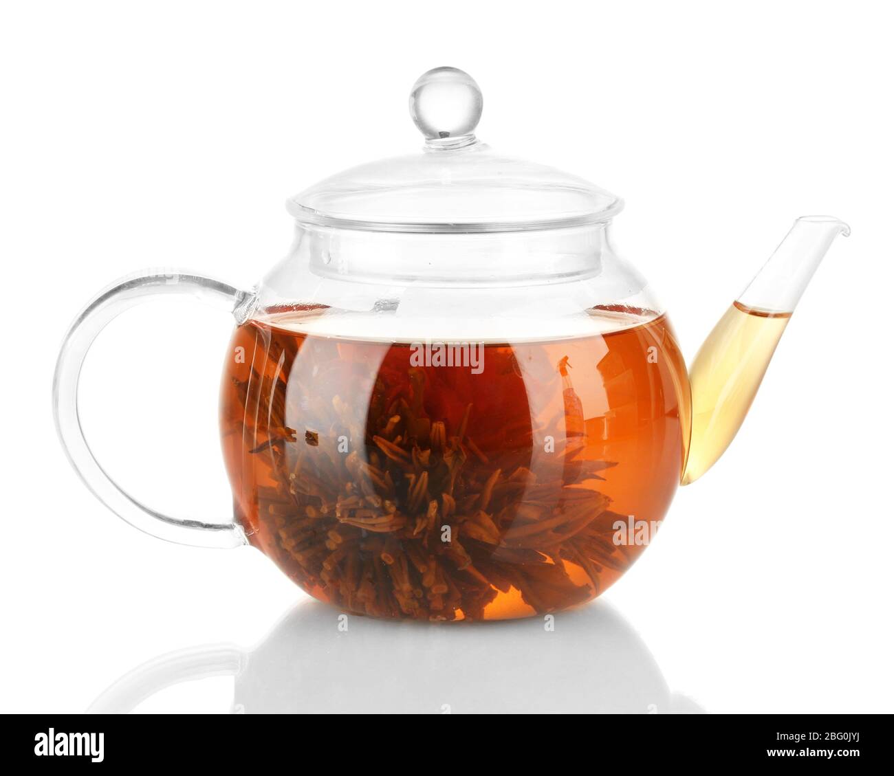 Exotic green tea with flowers in glass teapot isolated on white Stock ...
