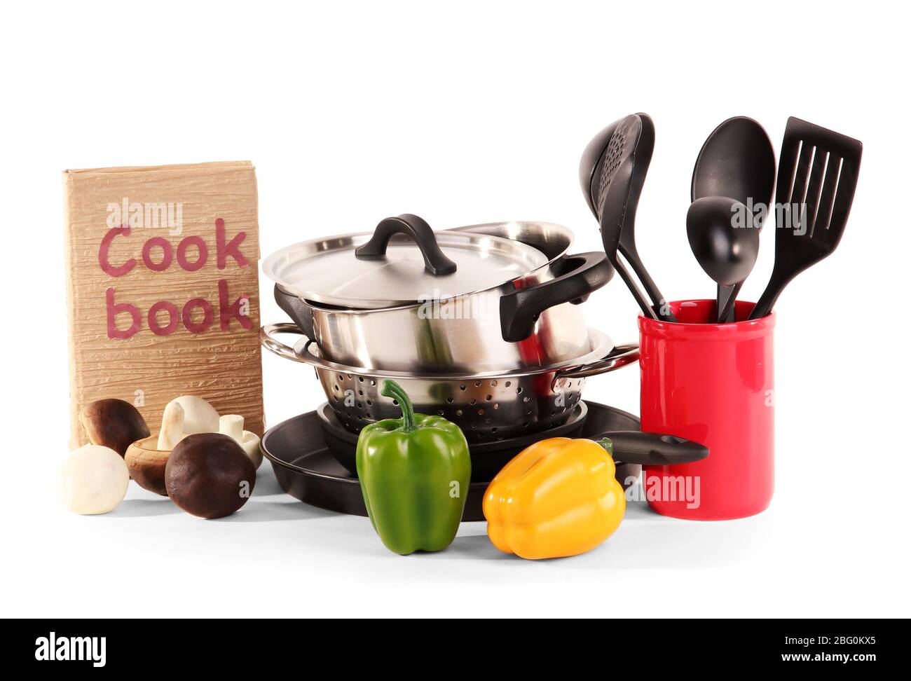 composition of kitchen tools and vegetables isolated on white Stock ...