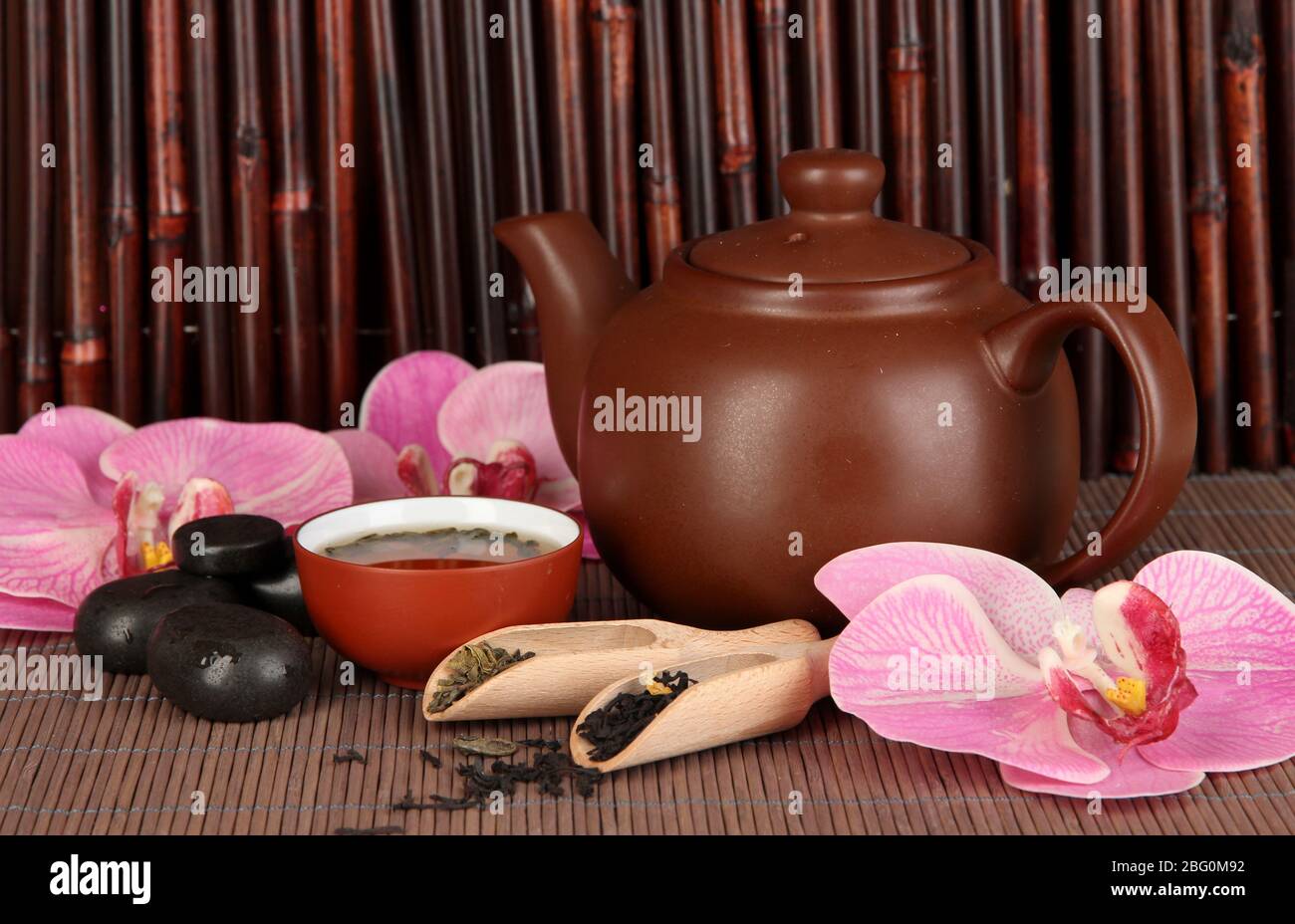 Chinese tea ceremony on bamboo table on bamboo background Stock Photo ...