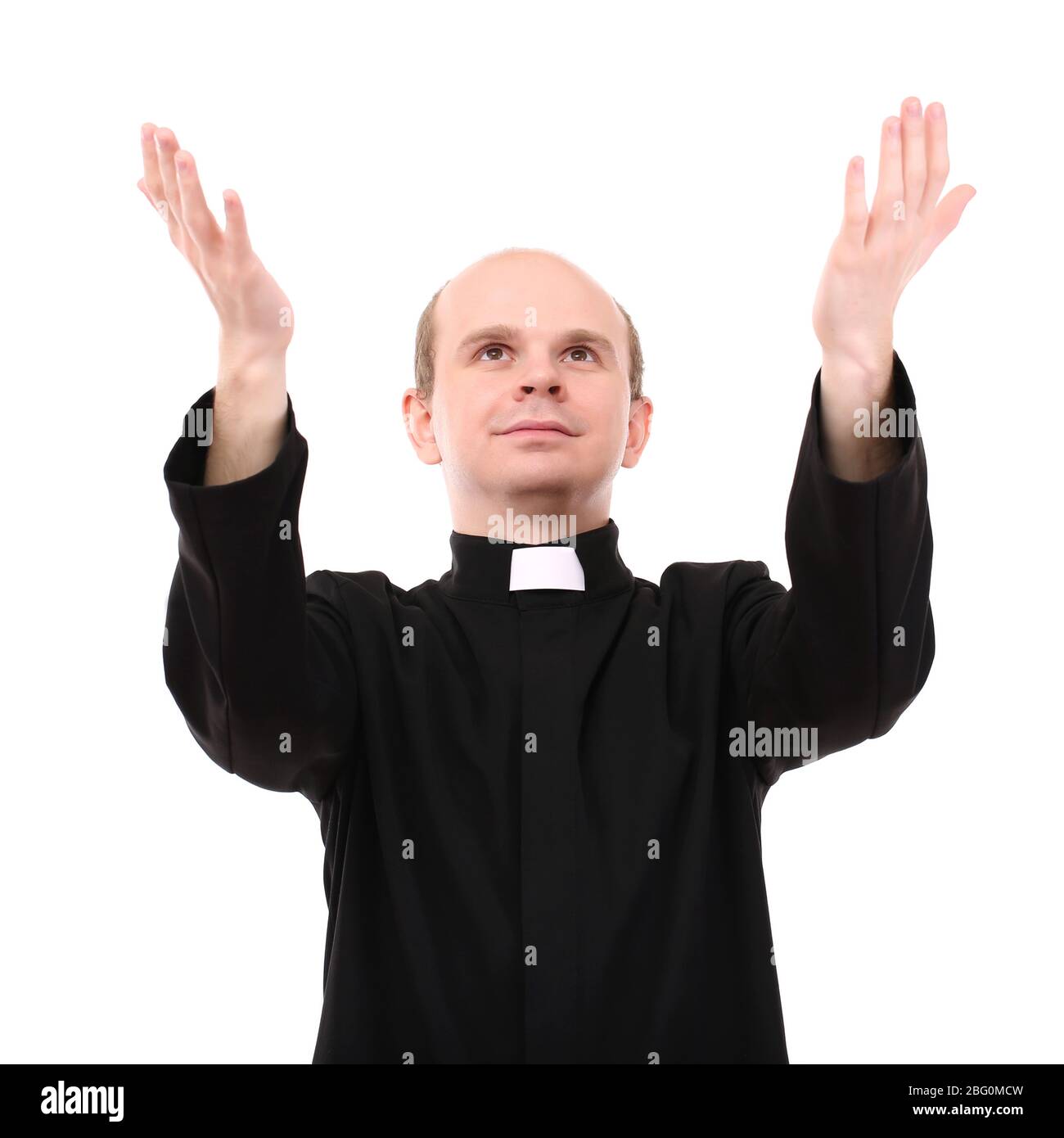 Young priest isolated on white Stock Photo - Alamy