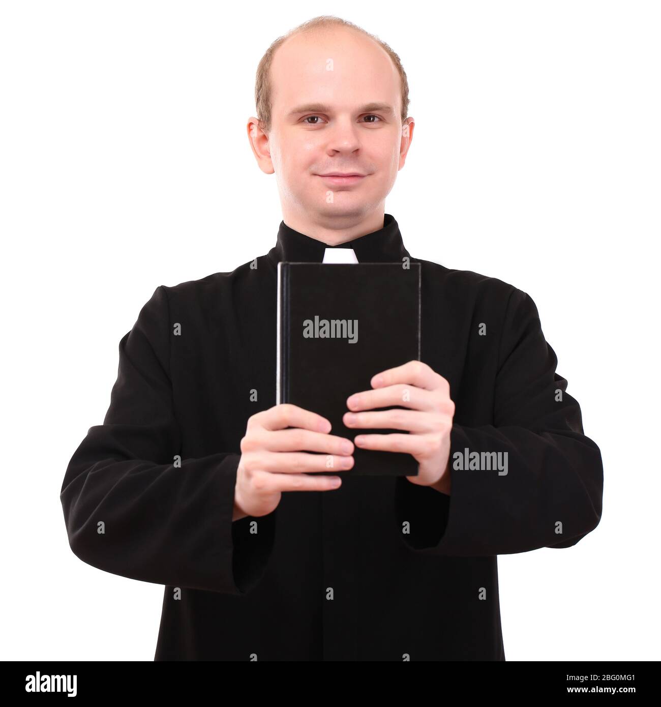 Young pastor with Bible, isolated on white Stock Photo - Alamy