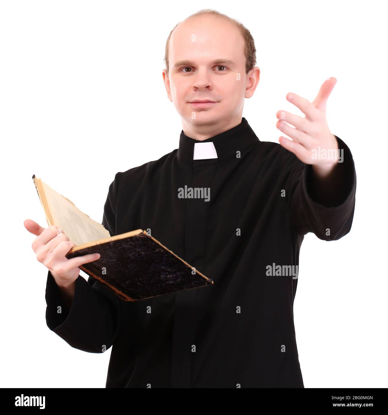 Young pastor with Bible, isolated on white Stock Photo - Alamy