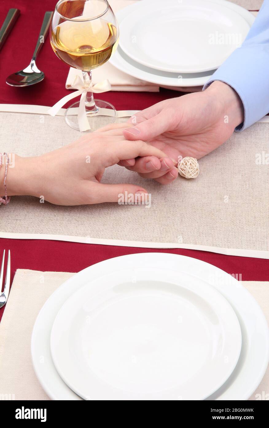 People hold hands over heart hi-res stock photography and images - Alamy