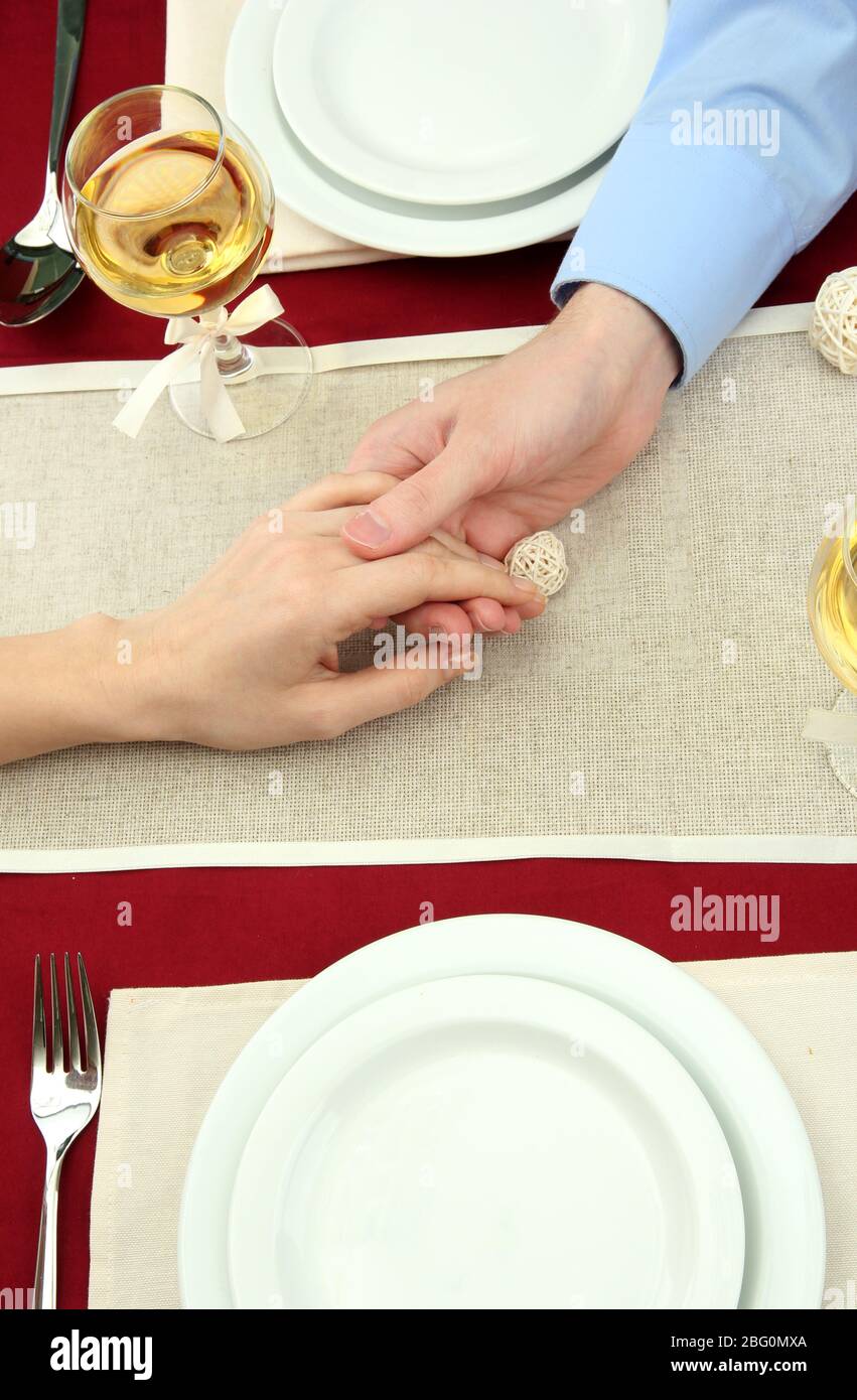 People hold hands over heart hi-res stock photography and images - Alamy