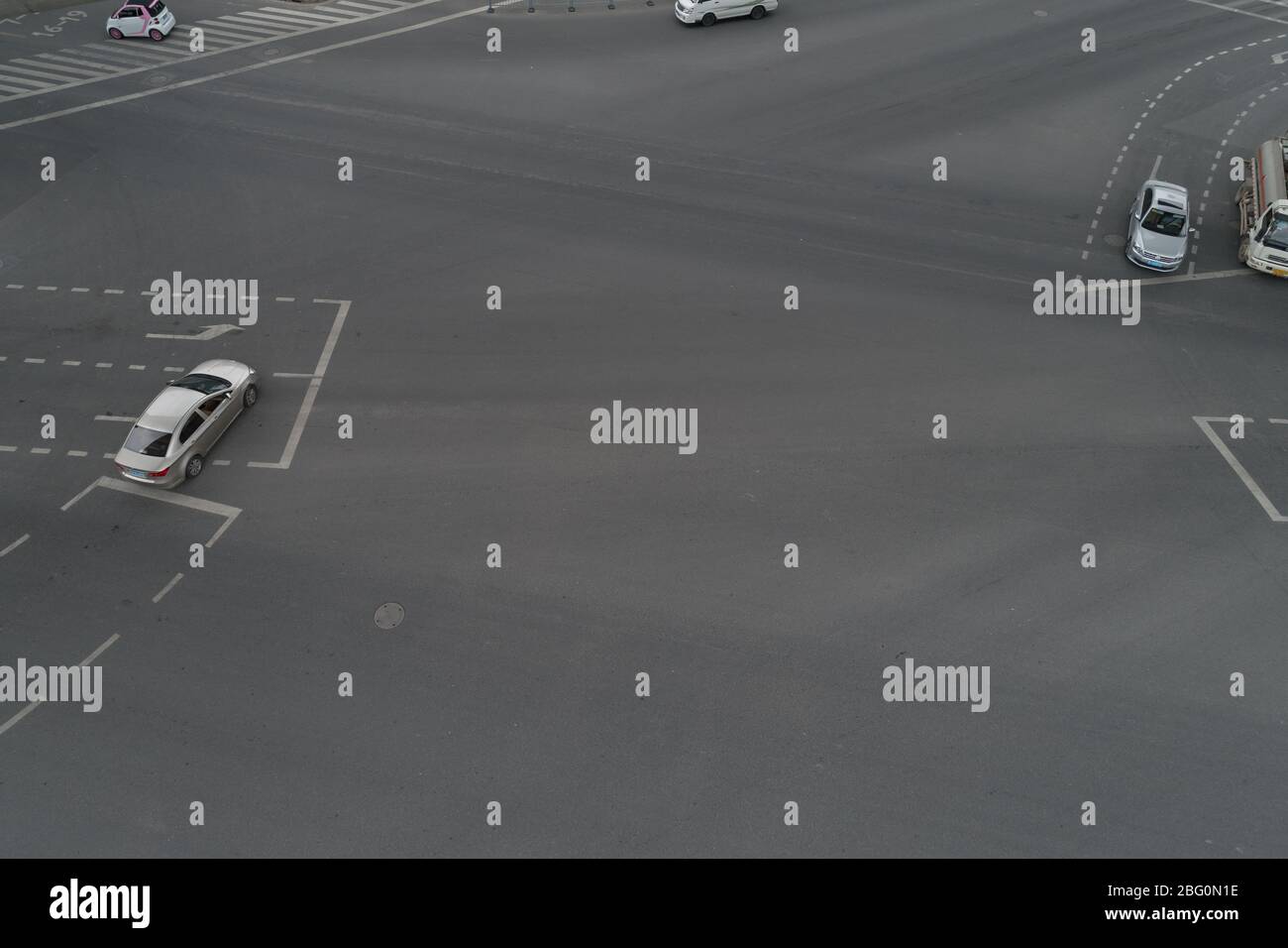 Aerial view on busy traffic intersection Stock Photo - Alamy