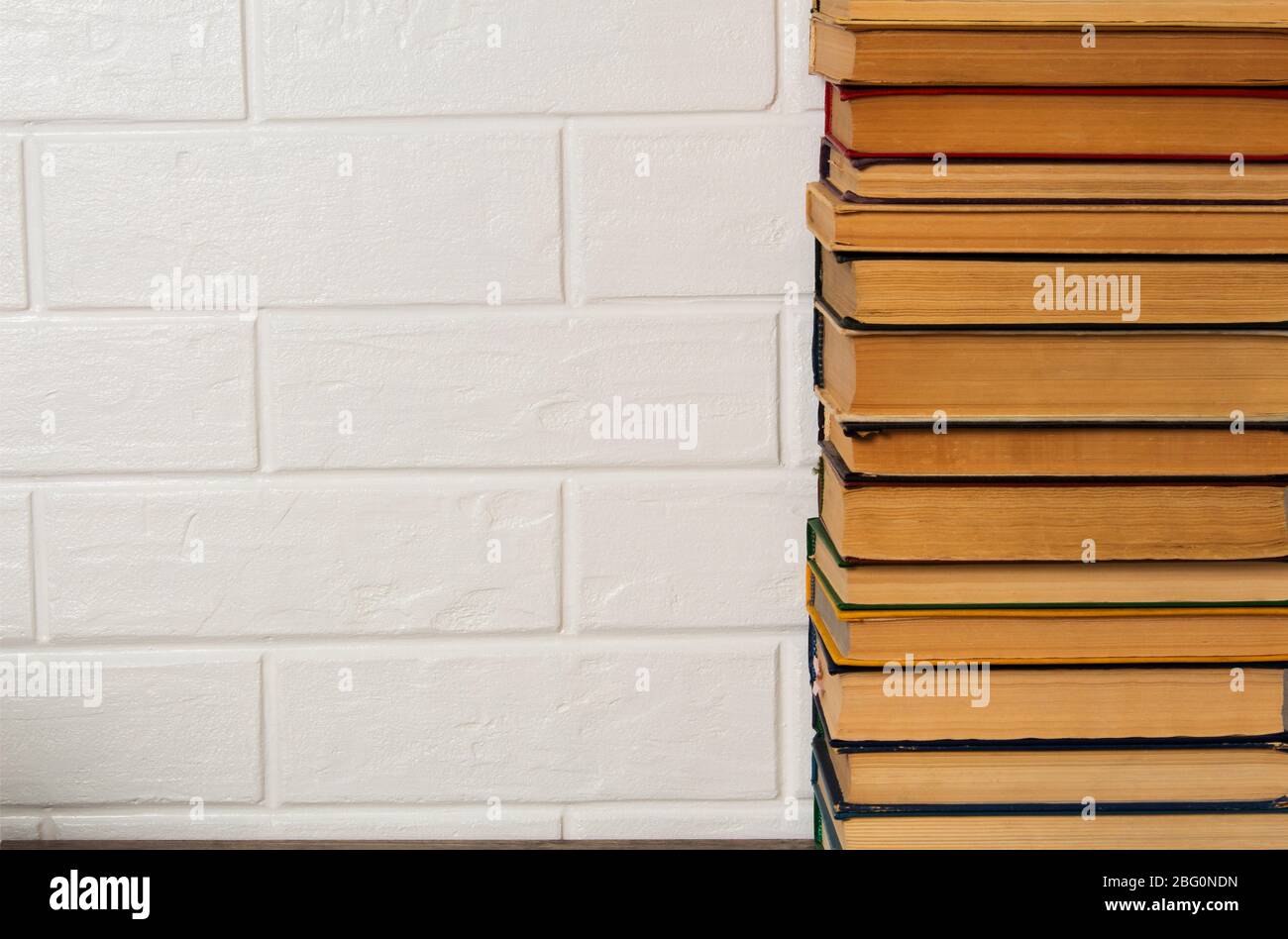 A stack of old books. Bookstore, library, bookshelf. Vintage, retro ...